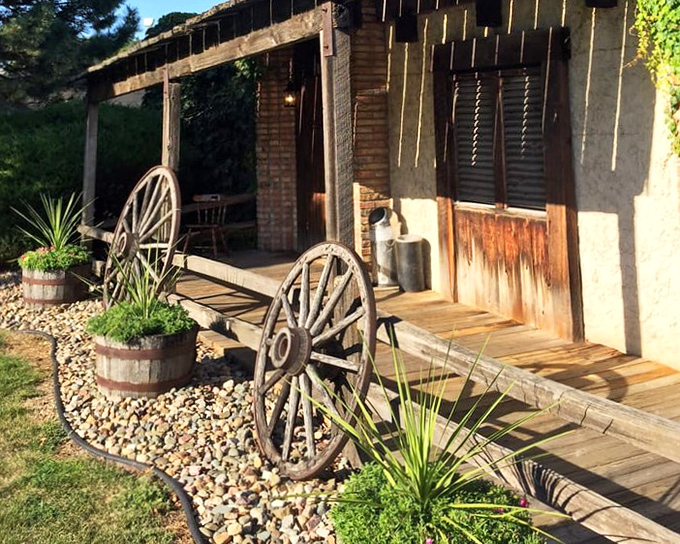 Rustic wagon wheels and weathered wood create the perfect backdrop for legendary beef.