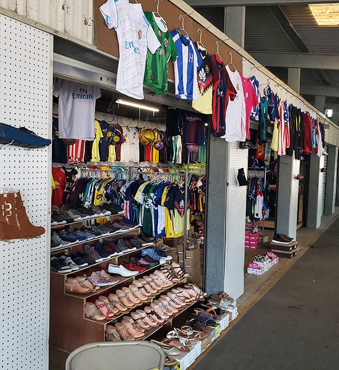 Soccer jerseys hang like international flags, turning this humble booth into a world cup of fashion finds.