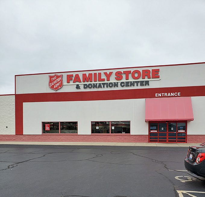 The Salvation Army's red and white facade radiates community spirit - where shopping helps neighbors while filling your home.