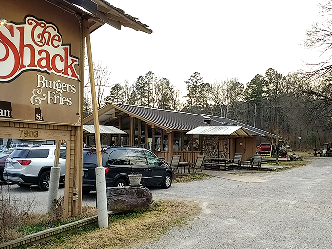 The Shack looks like it was plucked from a storybook forest. Those cars aren't parked—they're making a burger pilgrimage!