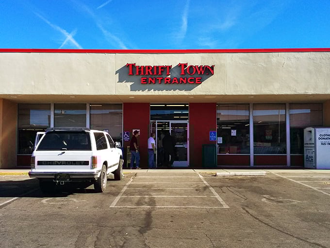 Thrift Town's bold red entrance stands like a portal to another dimension &ndash; one where everything costs less but brings more joy.