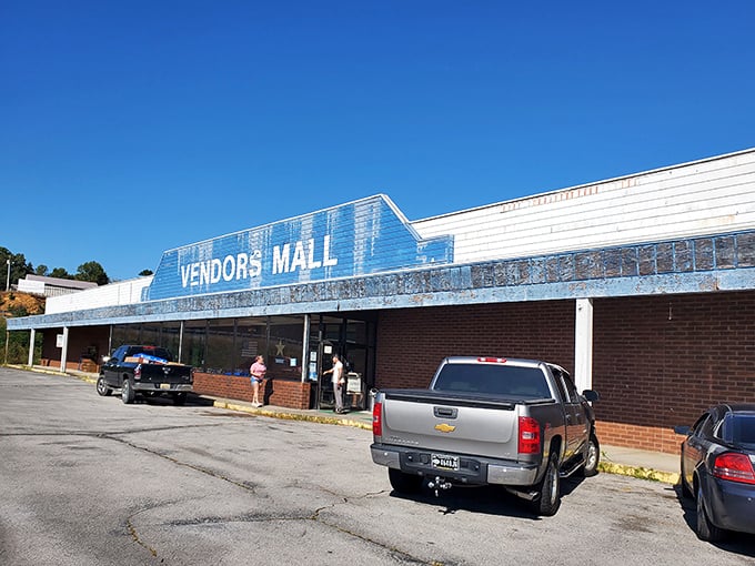 That turquoise-trimmed building promises weathered charm outside and organized treasure hunting within its vintage walls.