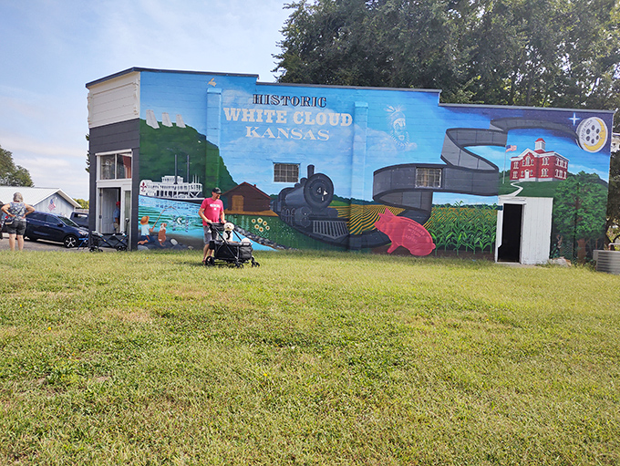 Historic White Cloud mural tells the town's story while flea market magic happens below.