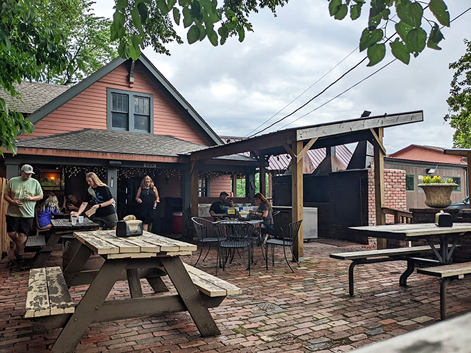 Woodyard's rustic charm feels like stumbling into a backyard BBQ party. That brick patio practically whispers "stay awhile."