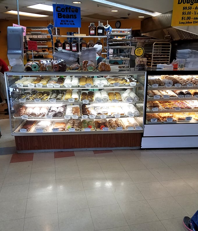 Pastry paradise awaits behind that glass. From cream-filled donuts to eclairs, this case is a museum of edible art.