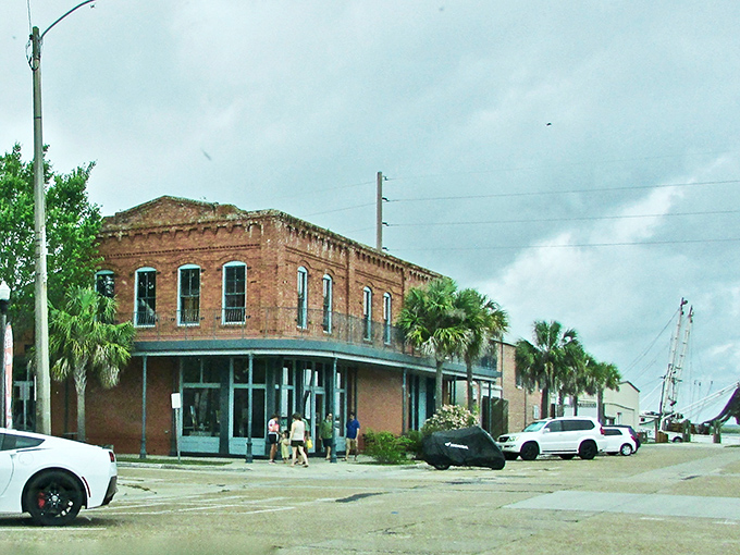 Historic brick buildings tell tales of Florida's maritime past while palm trees whisper promises of Gulf Coast adventures ahead.