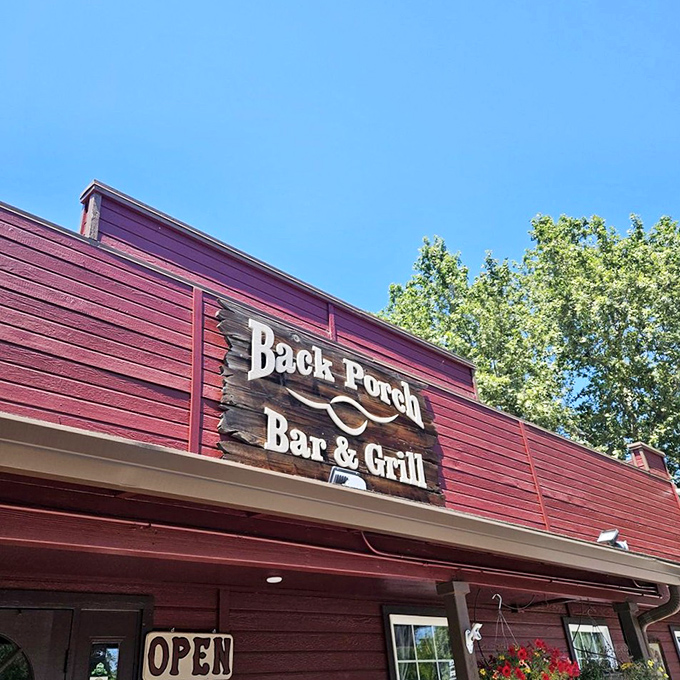 The Back Porch lives up to its name with this inviting facade. A small-town BBQ joint with big-time flavor hiding behind that simple sign.