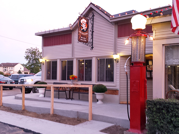 Bone Heads' vintage gas pump and welcoming porch say "slow down and stay awhile" &ndash; the universal language of proper BBQ joints.