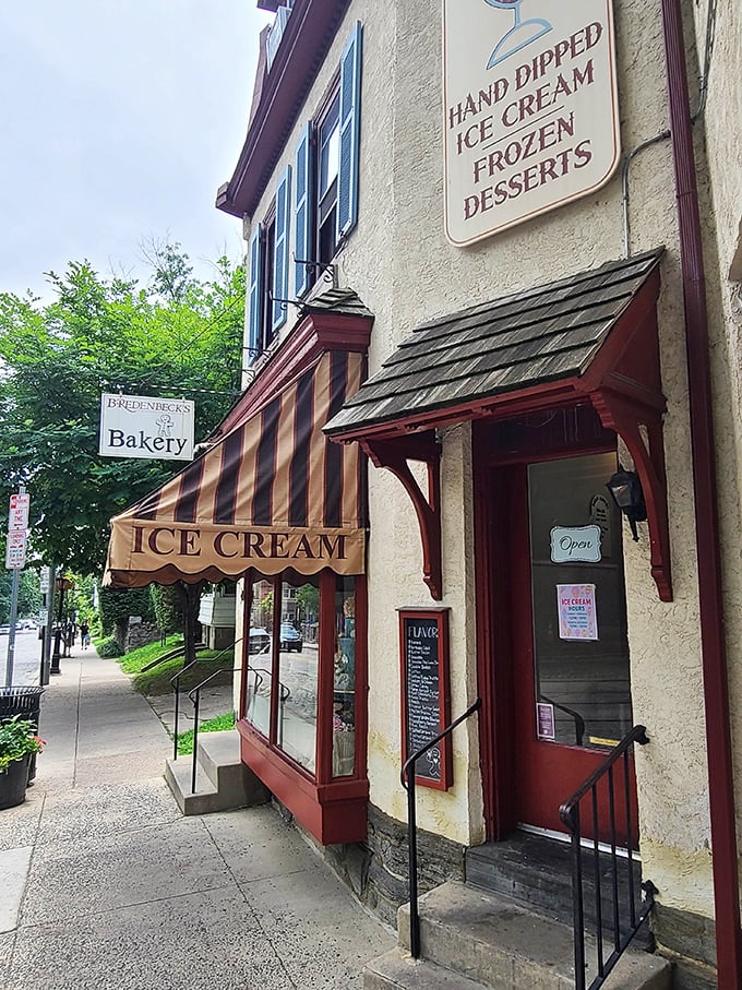 A striped awning and old-world charm frame Bredenbeck&rsquo;s Bakery, where ice cream cones and fresh pastries turn every visit into a timeless treat.