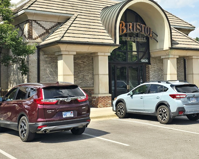 The sophisticated curved entrance of Bristol Seafood Grill &ndash; where Kansas dresses up for date night with the ocean's finest.
