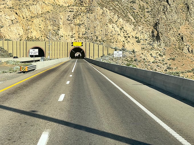Highway tunnels near Carlin cut through mountains with engineering precision. The gateway to adventures in Nevada's rugged backcountry.