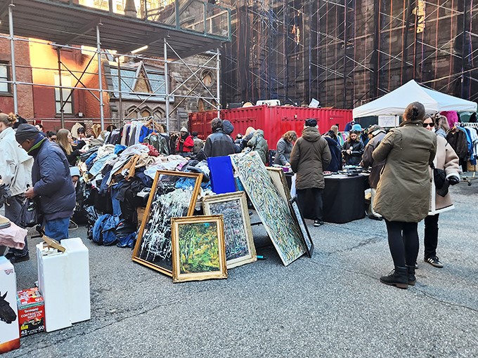 Art finds new admirers amid the bustle of a weekend market, where every frame tells a story waiting for a new home.