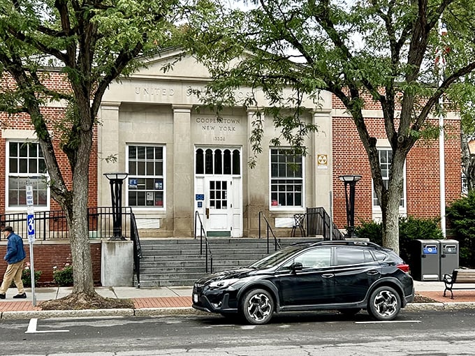 The old courthouse stands proudly, watching over Cooperstown like a wise grandfather telling baseball stories.