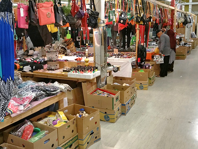 Rows of colorful purses hanging like party decorations - because every treasure hunt needs proper accessories.