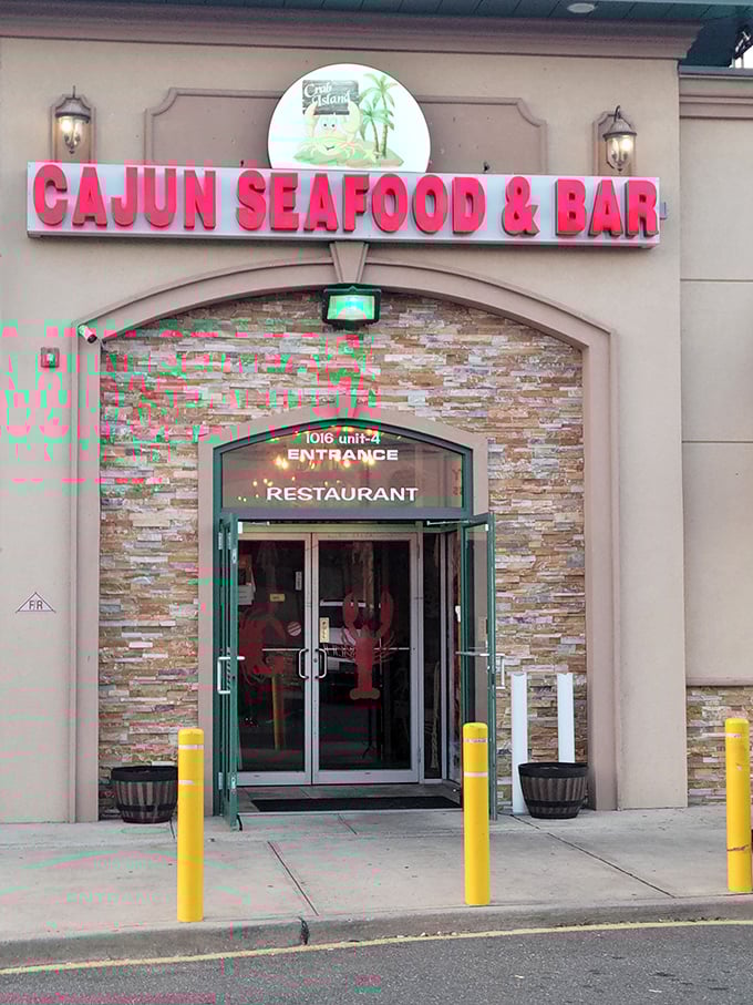 Yellow bollards guard seafood gold! Behind those glass doors, Cajun spices transform ordinary crustaceans into extraordinary flavor bombs worth protecting.