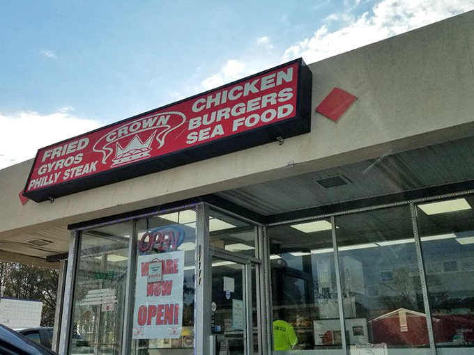 The sign promises variety, but we all know why you're really stopping at Crown Fried Chicken!