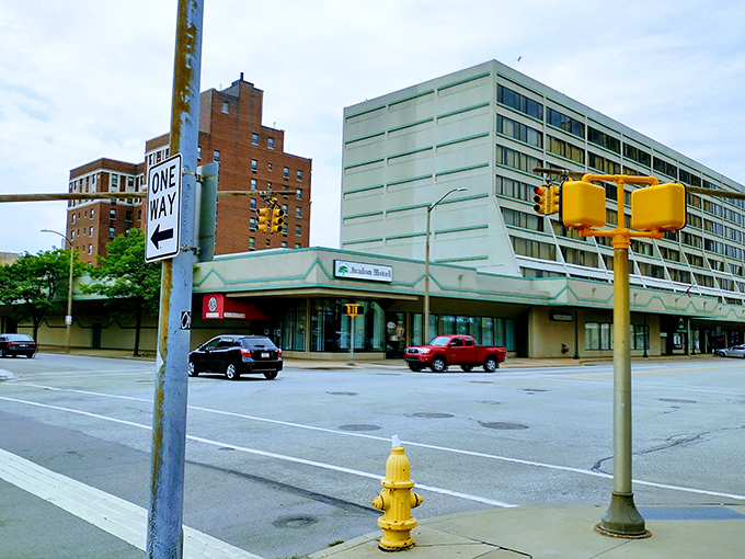 Wide streets and solid buildings suggest a city that values substance over expensive style.