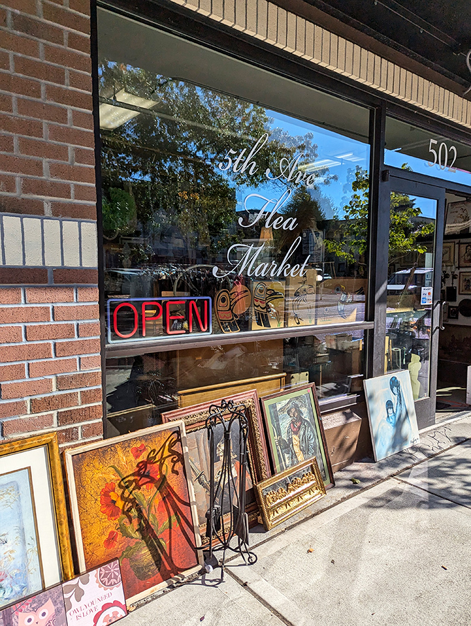 Framed artwork leans casually against the window, a preview of the curated treasures waiting inside.