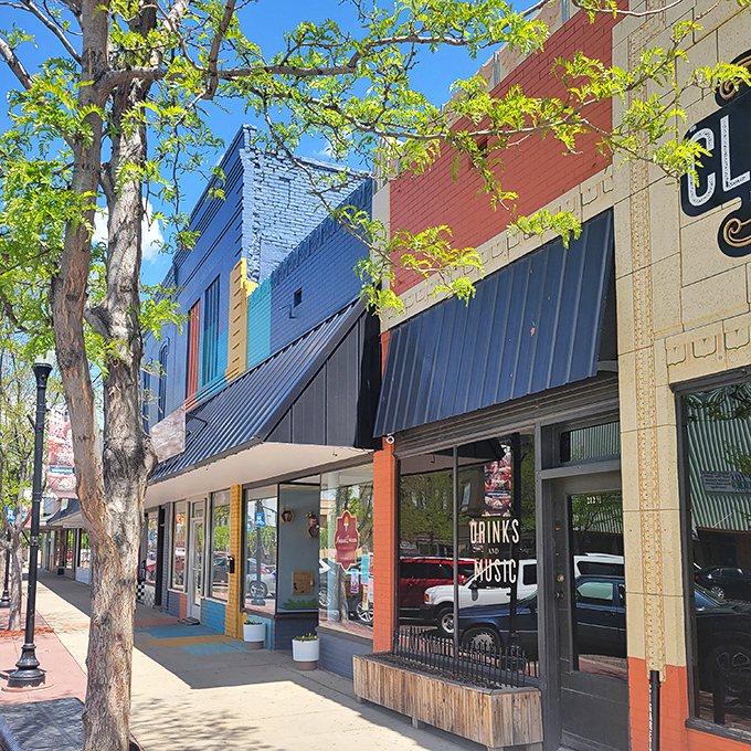 Vibrant awnings shelter sidewalk cafes where coffee conversations flow without breaking your monthly dining budget.