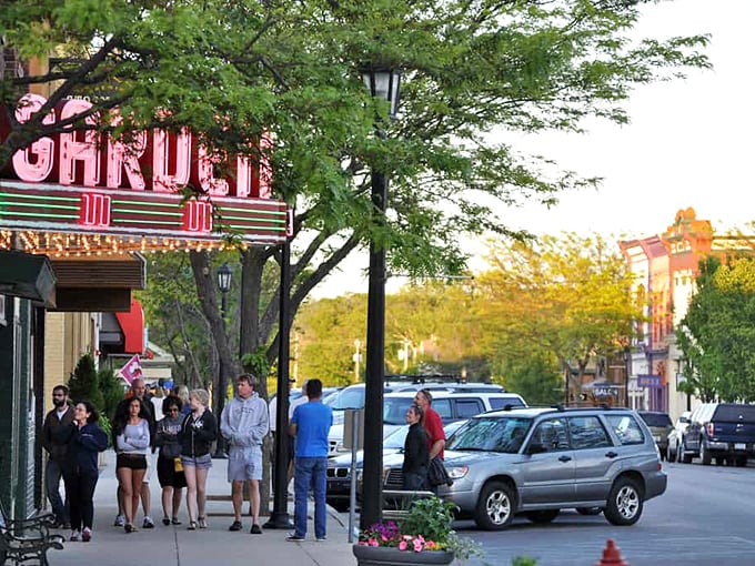 The historic Frankfort theater marquee glows, promising entertainment the way it used to be &ndash; communal and magical.