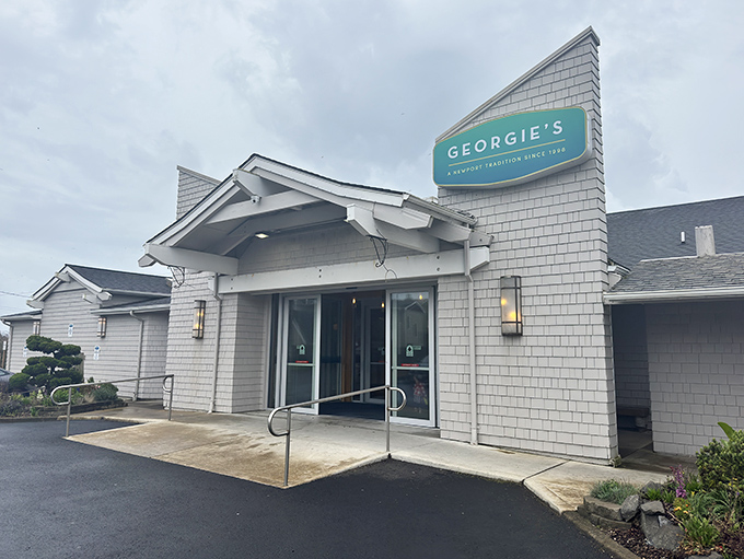 Georgie's clean lines and classic gray shingles create the perfect frame for Newport's dramatic seascape.