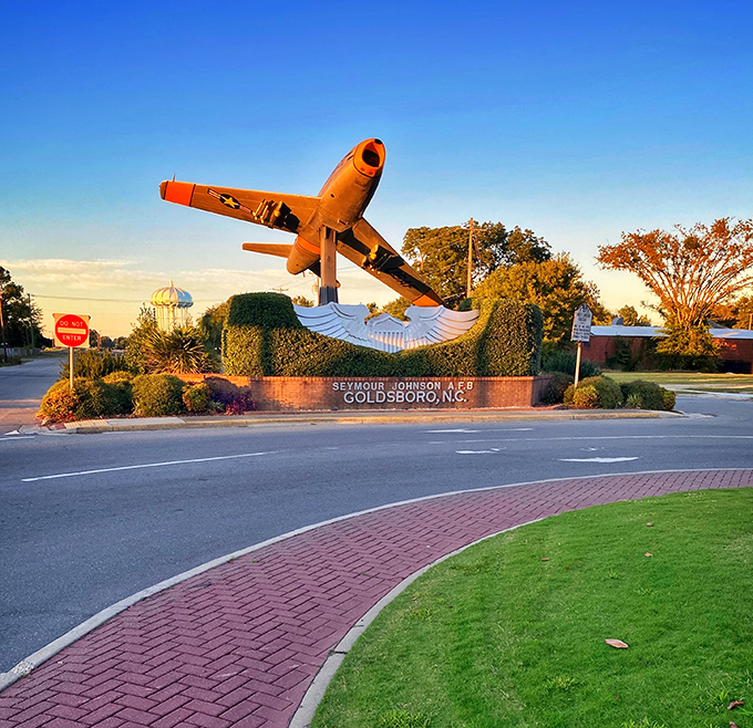 Goldsboro greets visitors with a vintage fighter jet display&mdash;because nothing says "peaceful retirement" quite like military aviation history!