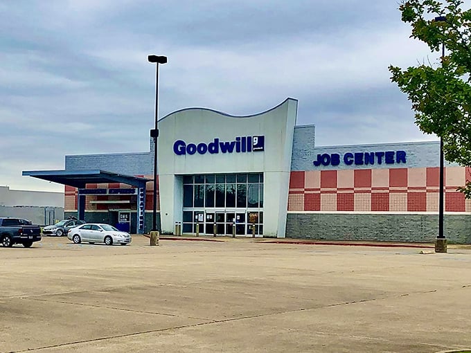 Another angle of Goodwill's welcoming facade, where Louisiana's humidity stays outside while cool bargains wait within.