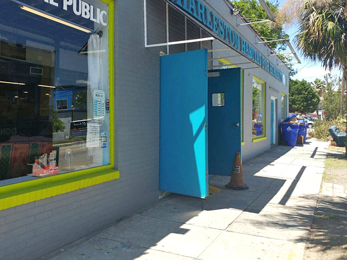 Bright colors and big windows invite curious shoppers into this Habitat ReStore. The blue door practically whispers, "Bargains this way!"