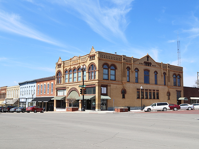Corner office envy! Hiawatha's grand three-story showstopper flaunts arched windows and tan brick elegance that screams "I was somebody when somebody meant something."