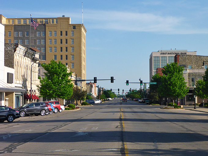 Tree-lined streets and vintage storefronts create the perfect backdrop for affordable adventures in authentic small-town Kansas living.