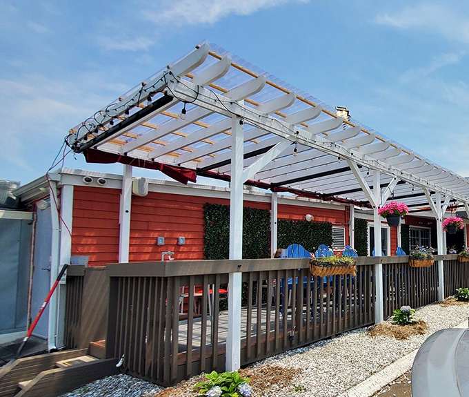 The covered patio at Lobster Shack offers welcome shade for summer dining. Perfect spot to savor those chunks of sweet lobster meat.