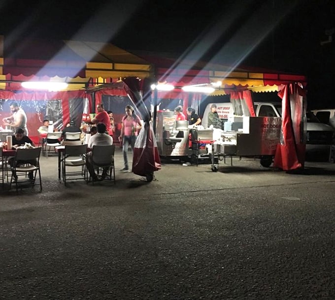 Lupita's outdoor setup creates the perfect street food atmosphere. Nothing beats enjoying a bacon-wrapped dog under twinkling lights.