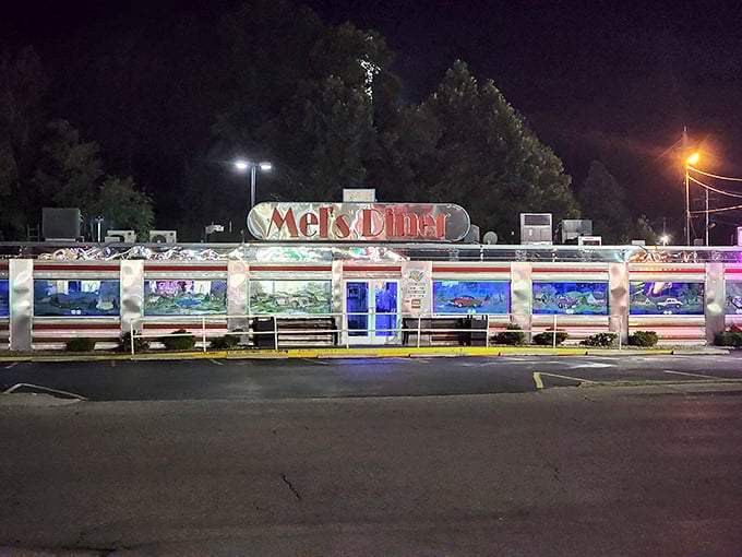 After dark, Mel's neon lights transform this Pigeon Forge diner into a glowing beacon of comfort food possibilities.