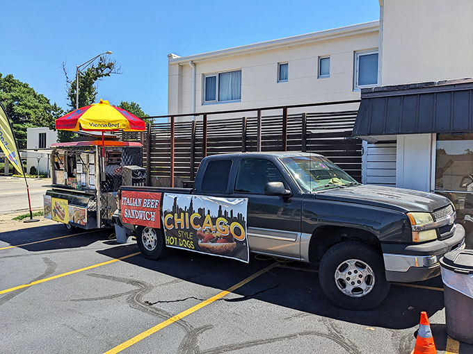 This colorful food truck transforms any parking lot into a gourmet destination with authentic Chicago-style hot dog perfection.
