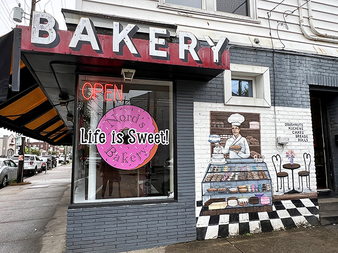 That vintage "BAKERY" sign has been guiding sugar-seekers to this storybook building for decades of delicious memories.