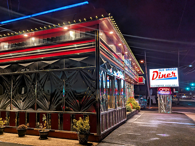 After dark, this artistic gem glows like a beacon, drawing families together for hearty meals and good times.