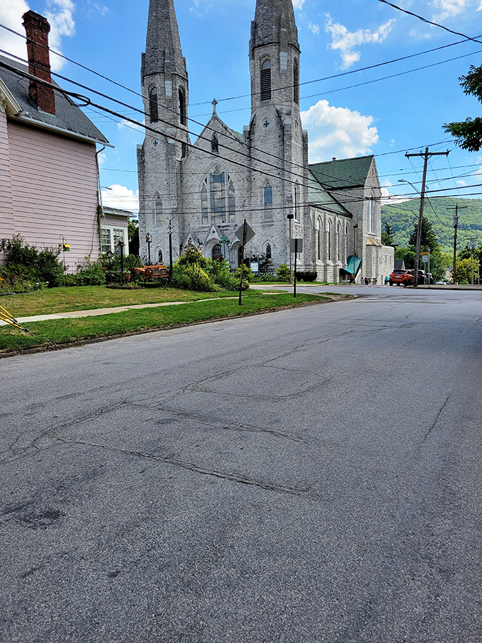 This stone church stands as a testament to faith and craftsmanship, anchoring the community with timeless grace.
