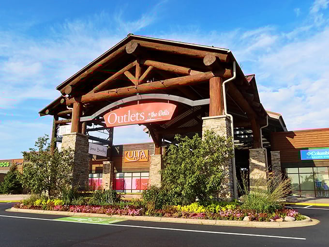 Massive timber beams and stone pillars make this the most impressive mall entrance in Wisconsin—shopping with mountain lodge vibes!