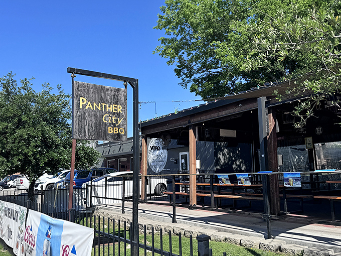 Panther City's outdoor setup has that perfect backyard BBQ vibe. The kind of place where strangers become friends over brisket.