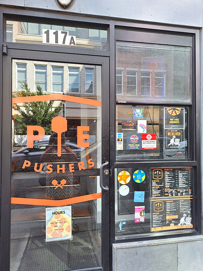 Orange logo, extraordinary pies! Pie Pushers might be small in square footage, but it's massive in pizza personality.