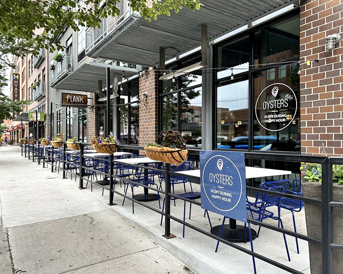 Those blue chairs outside promise happy hour deals that'll make your wallet smile. 