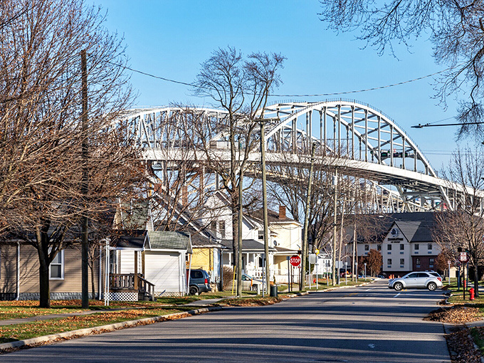 Port Huron's Blue Water Bridge arches overhead like a steel rainbow, connecting two nations with engineering elegance.