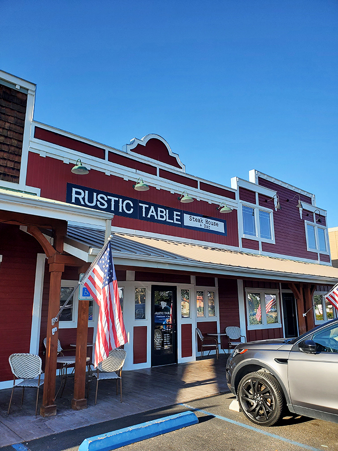 American flags flutter outside the Rustic Table, where patriotism and prime rib go hand in hand.