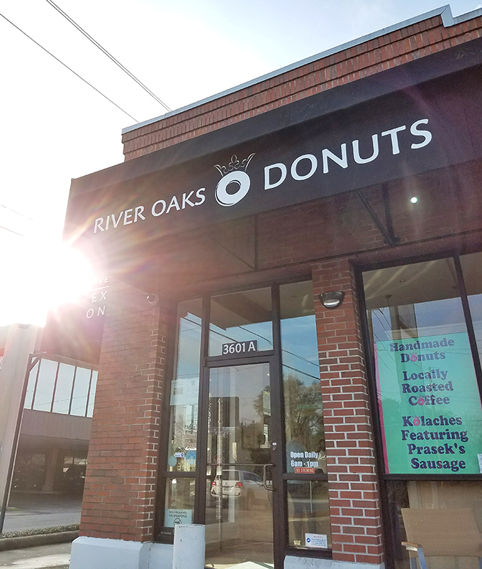 Sunrise at River Oaks Donuts&mdash;where brick, flowers, and promises of "Handmade Donuts" come together in perfect morning harmony. Even the building looks delicious.
