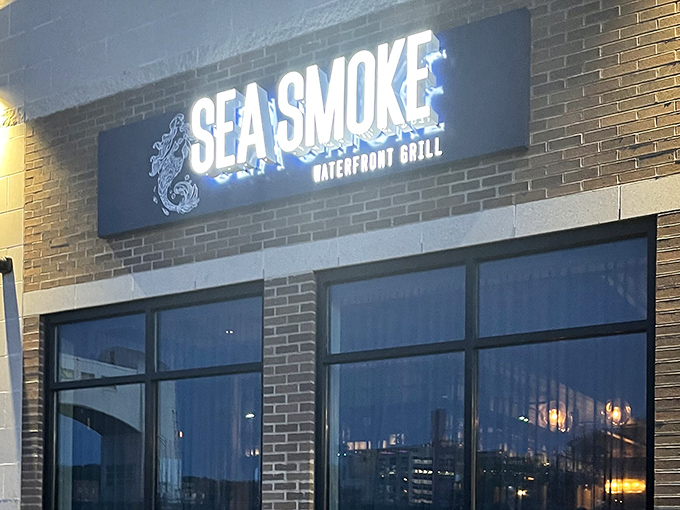 Floor-to-ceiling windows frame the water view like a living postcard you can actually taste and enjoy.