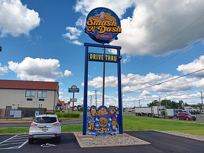 That bright blue sign beckons hungry travelers like a beacon of deliciousness.