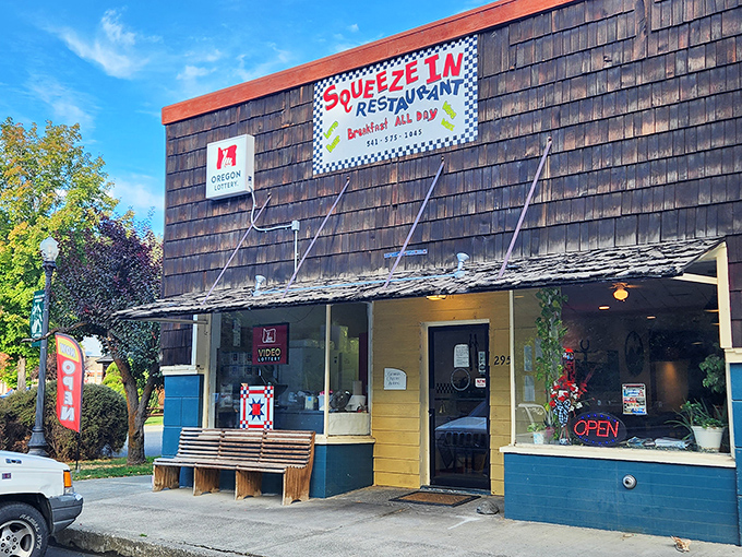 Weathered wood and a sunny yellow door&mdash;the Squeeze-In looks like it was built by breakfast-loving pioneers with excellent taste.
