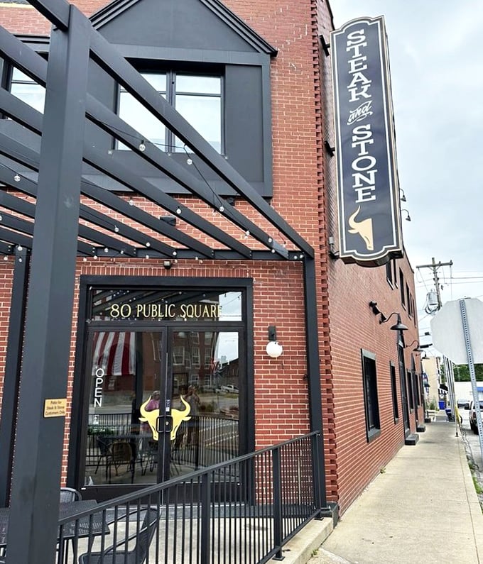 That bold steer silhouette promises serious beef business in this perfectly positioned public square gem.