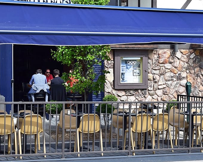 The perfect people-watching patio for sipping white wine and savoring seafood on a Michigan summer evening.