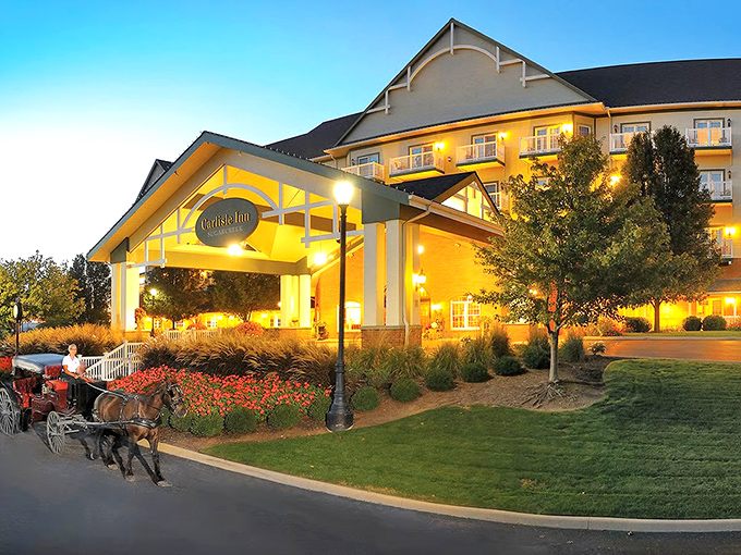 The Carlisle Inn glows warmly at dusk, promising the kind of hospitality your grandmother would approve.